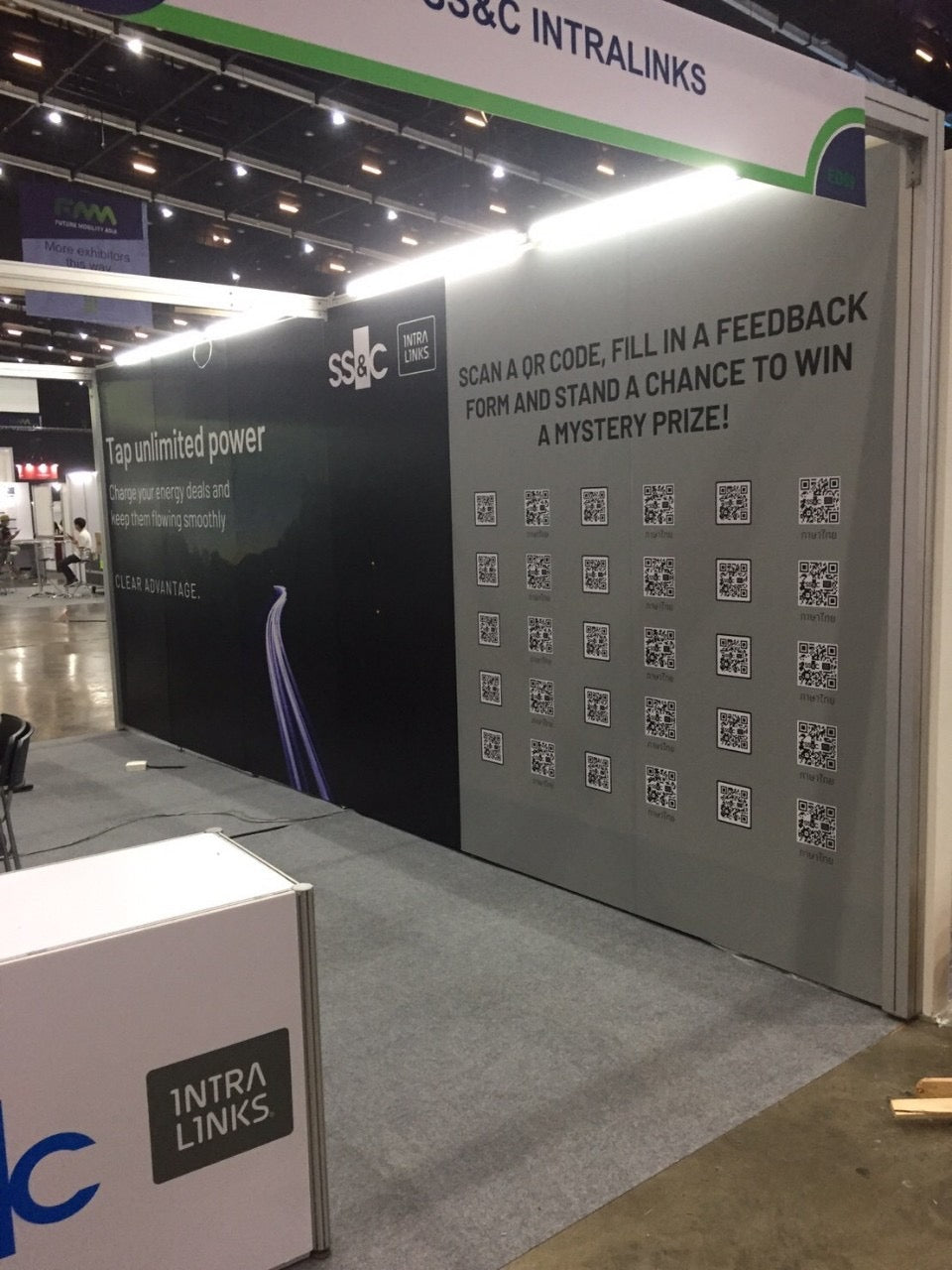 Foam board sign on the wall of the exhibition booth – Octopus Media ...