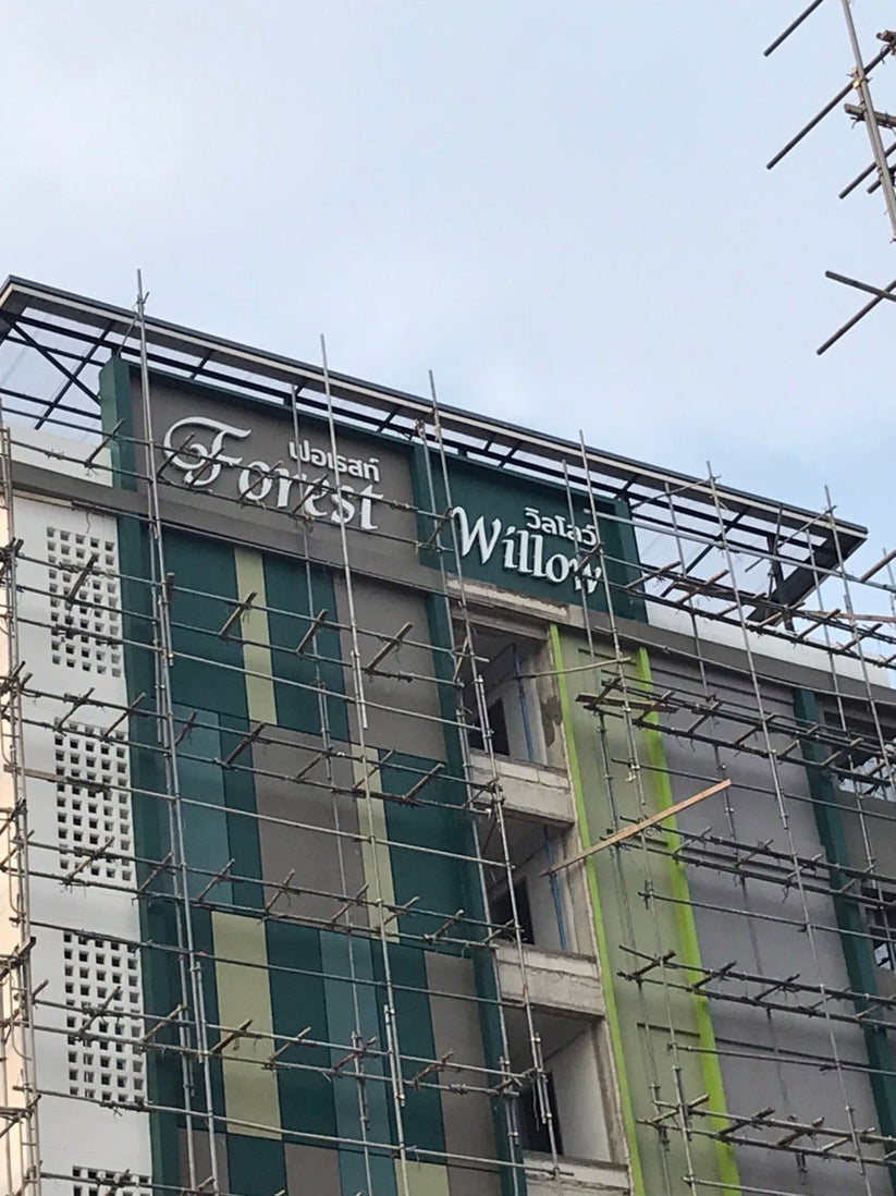 Install the sign by setting up scaffolding. performed with skill