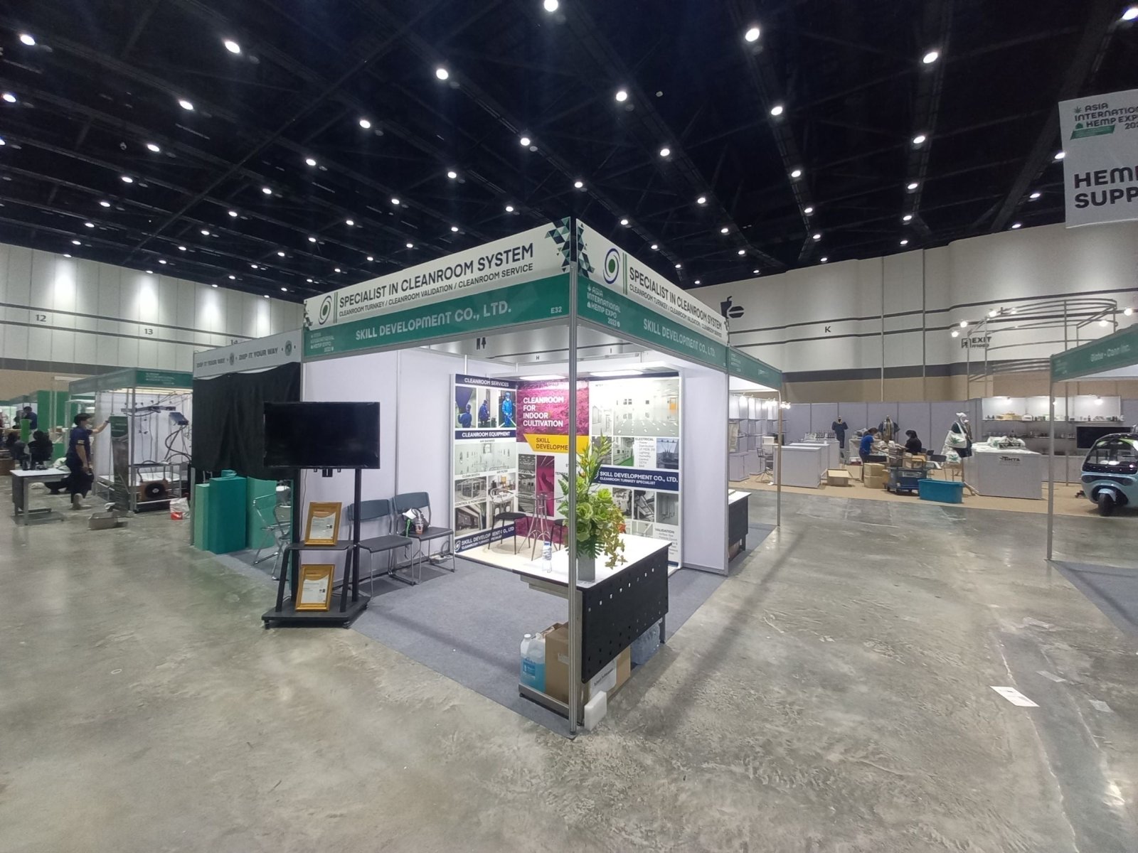 Foam board sign on the wall of the exhibition booth – Octopus Media ...